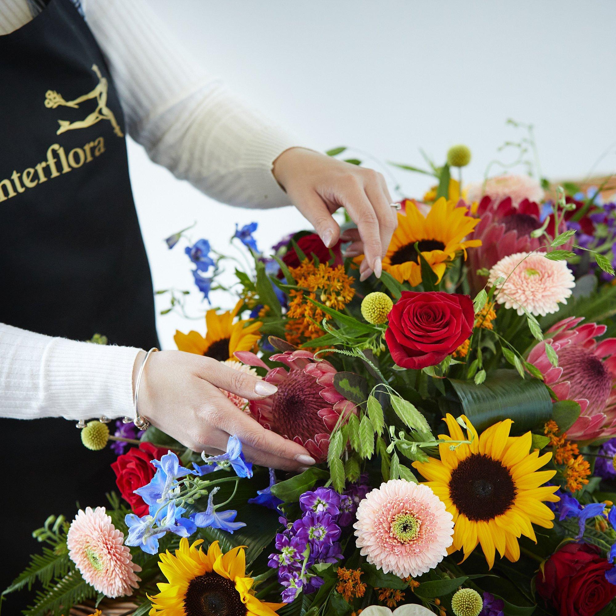 Natural Vibrance Casket Spray - Interflora | Interflora